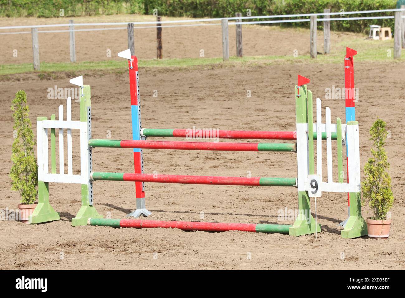 Show jumping poles obstacles, barriers, waiting for riders on show ...