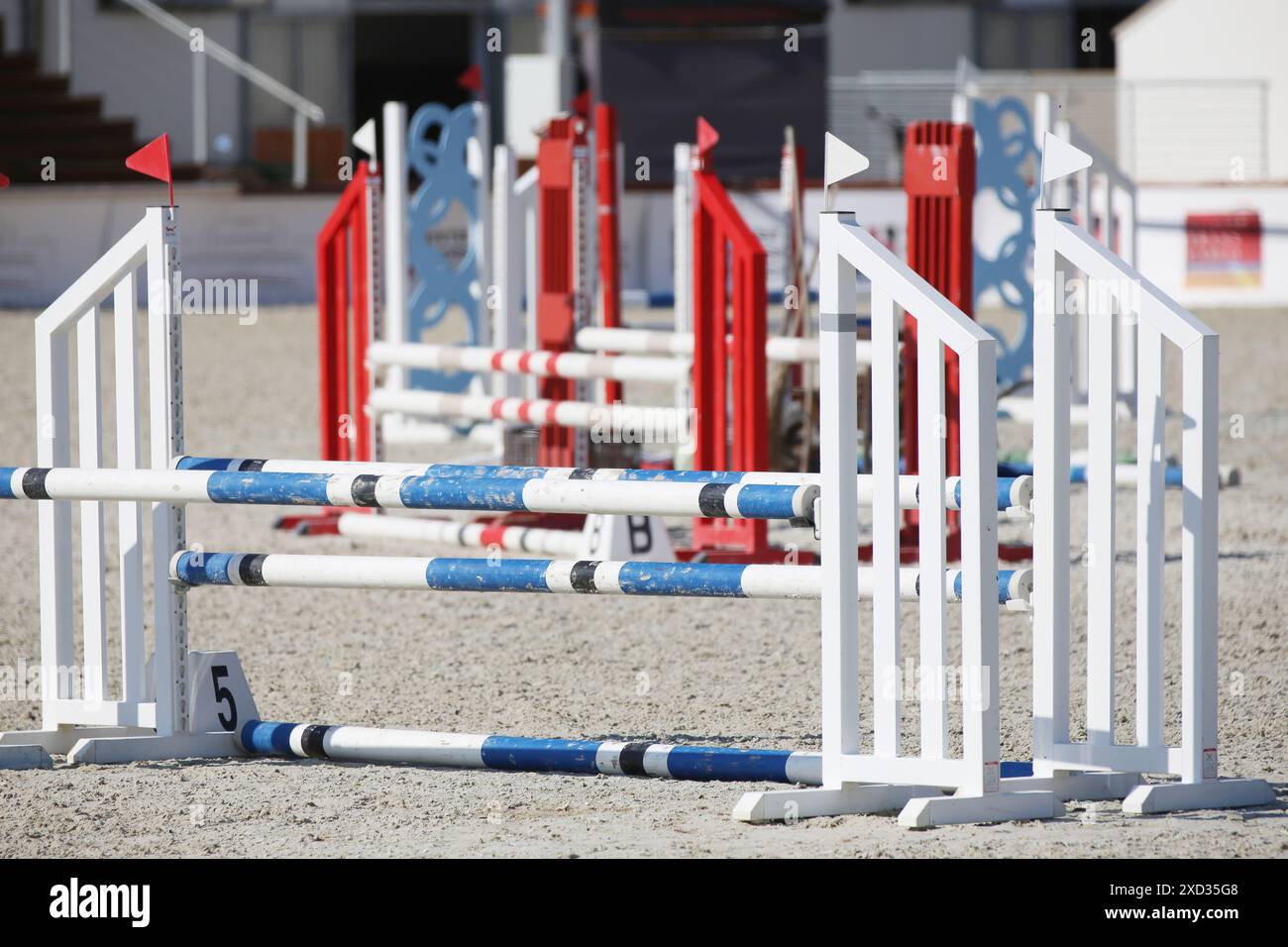 Show jumping poles obstacles, barriers, waiting for riders on show ...