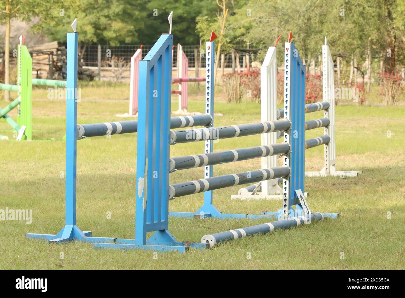 Show jumping poles obstacles, barriers, waiting for riders on show ...