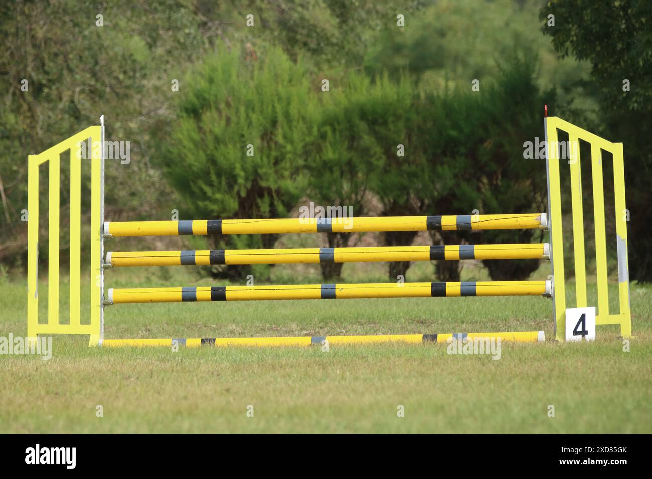 Show jumping poles obstacles, barriers, waiting for riders on show ...