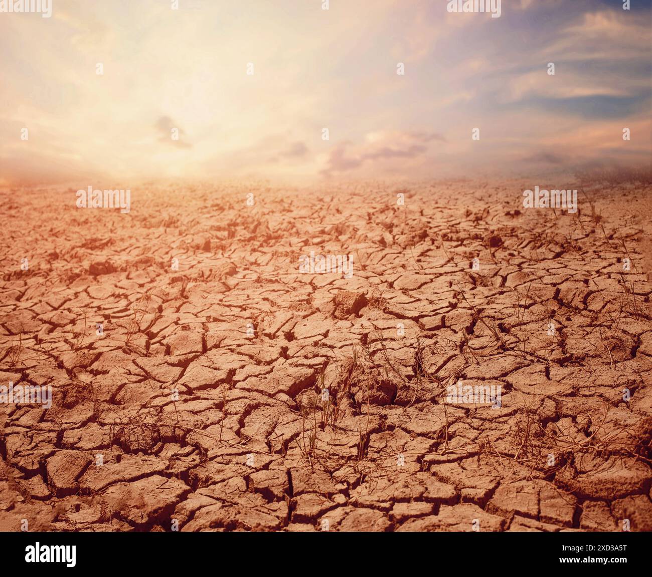 Red dry cracked earth, parched land under sky clouds. Earth dirt ...