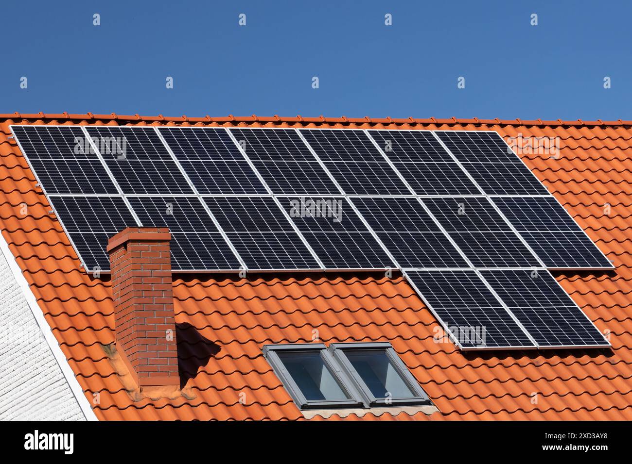 Solar Panels on Red Tiled Roof Stock Photo - Alamy