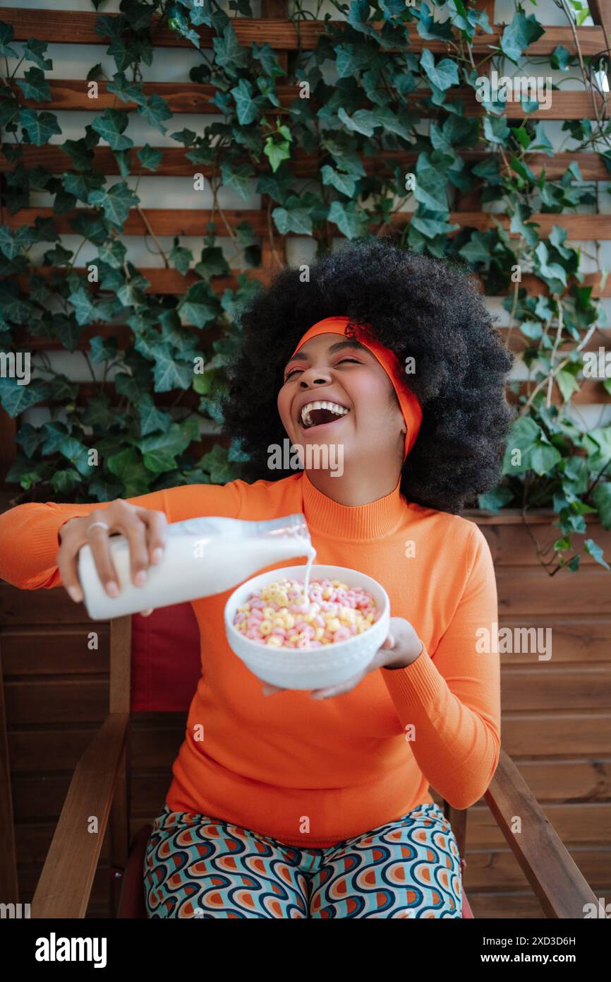 A joyful Black African american woman dressed in a quirky 50s inspired ...