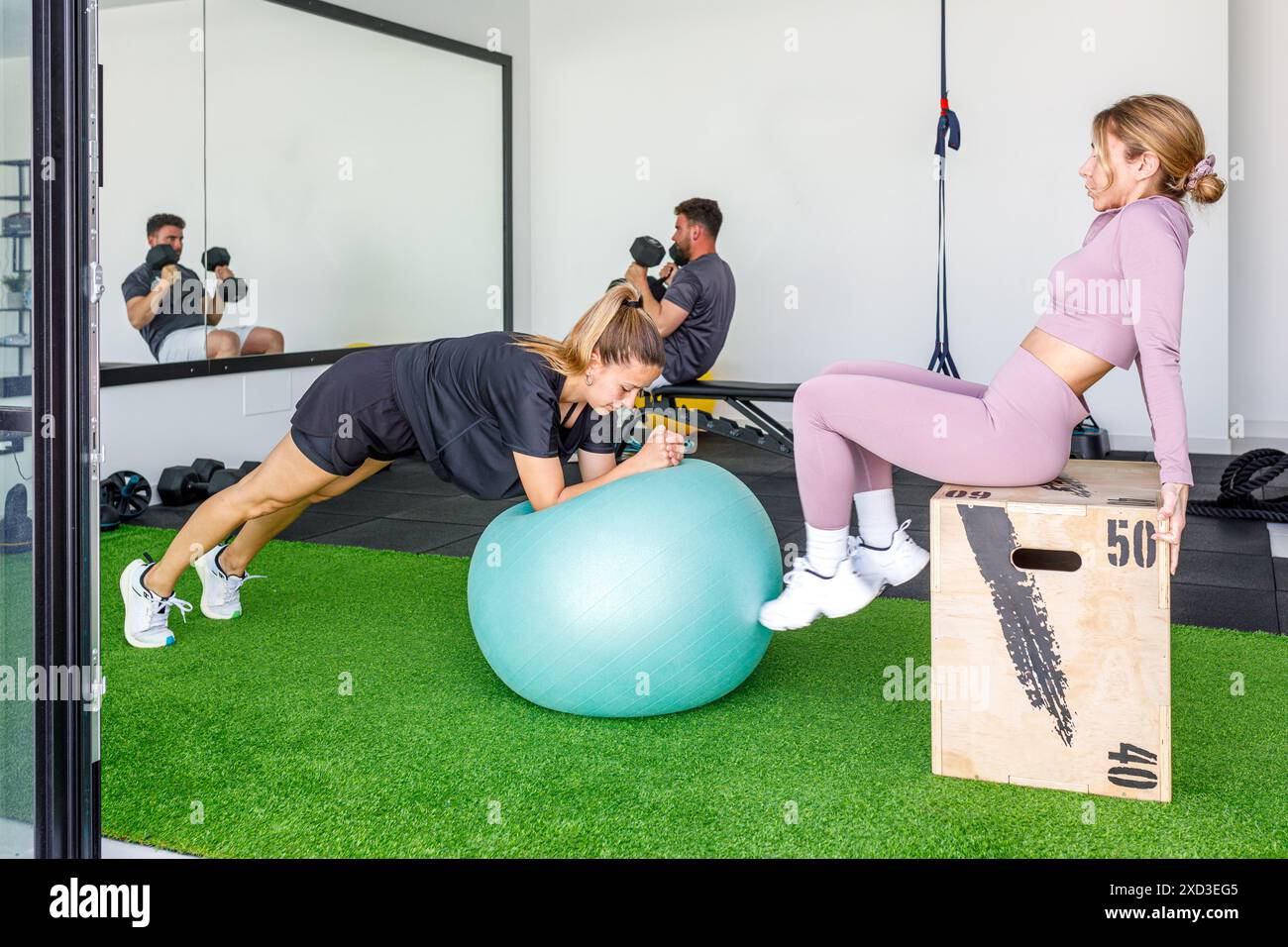 A vibrant gym scene with two women and a man engaging in different ...