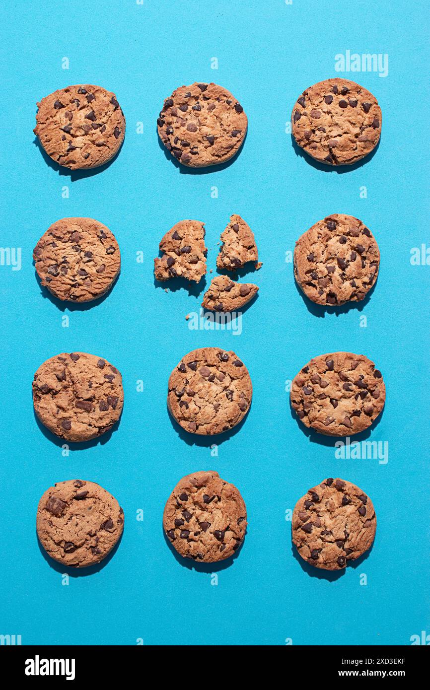 Flat lay photography of twelve chocolate chip cookies arranged on a ...