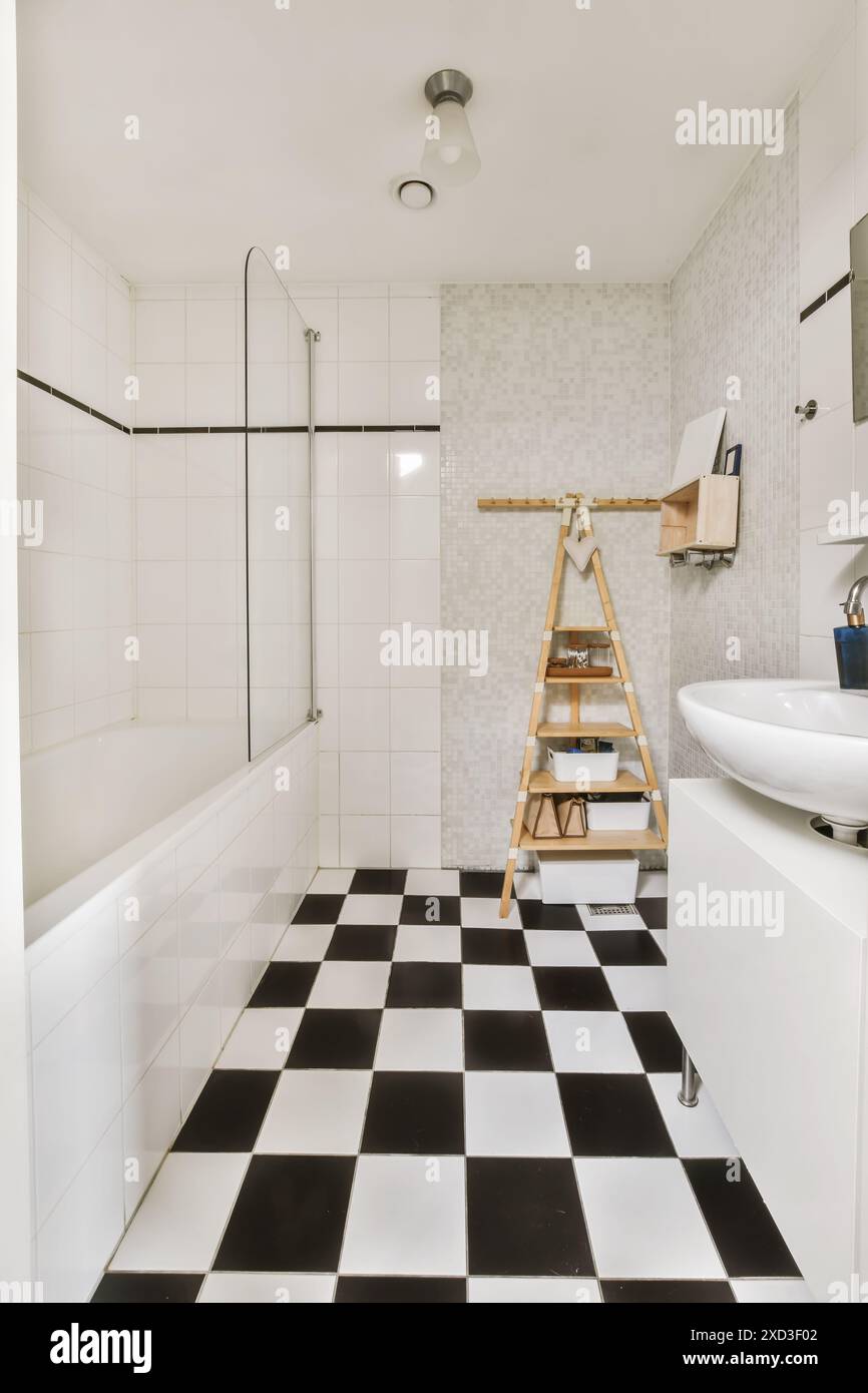 A sleek and modern bathroom design featuring black and white checkered ...