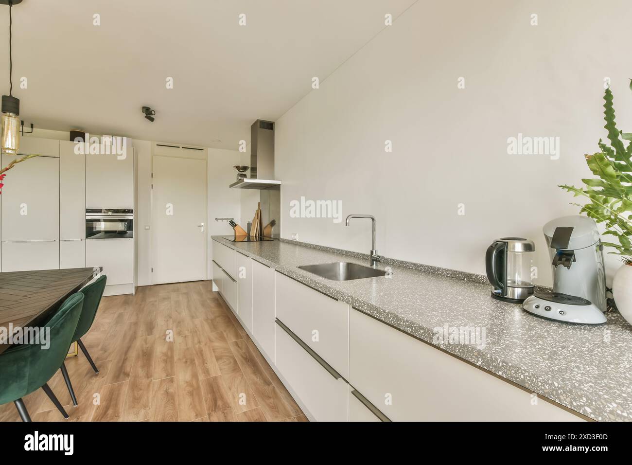 Contemporary kitchen space features hi-res stock photography and images ...