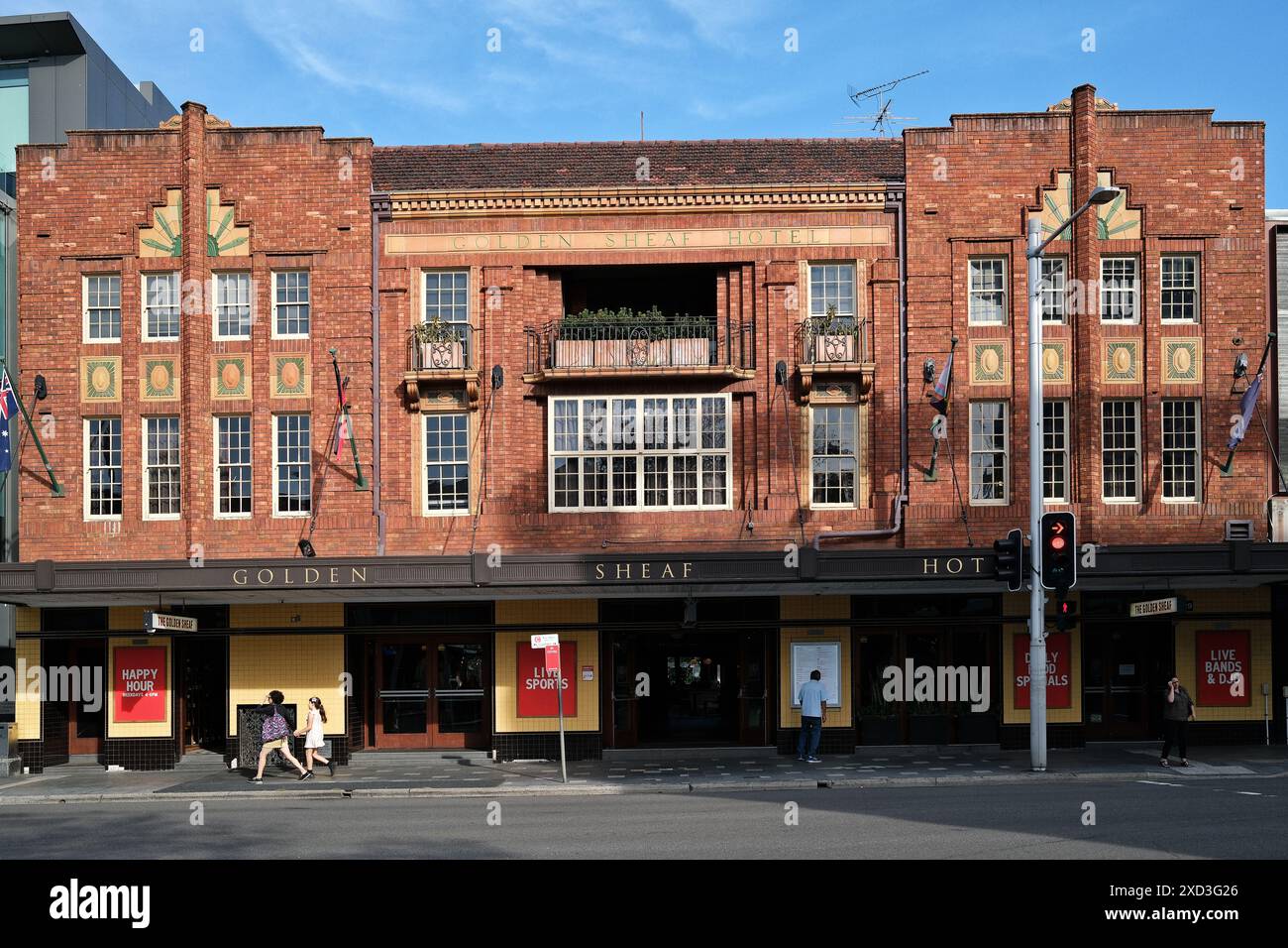 The art deco brick and tile facade of the Golden Sheaf Hotel on New ...