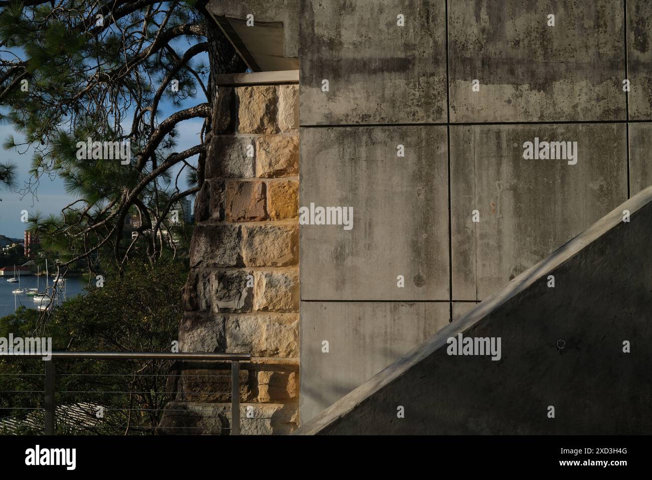 Cast concrete wall & balustrade with hewn sandstone block wall at ...