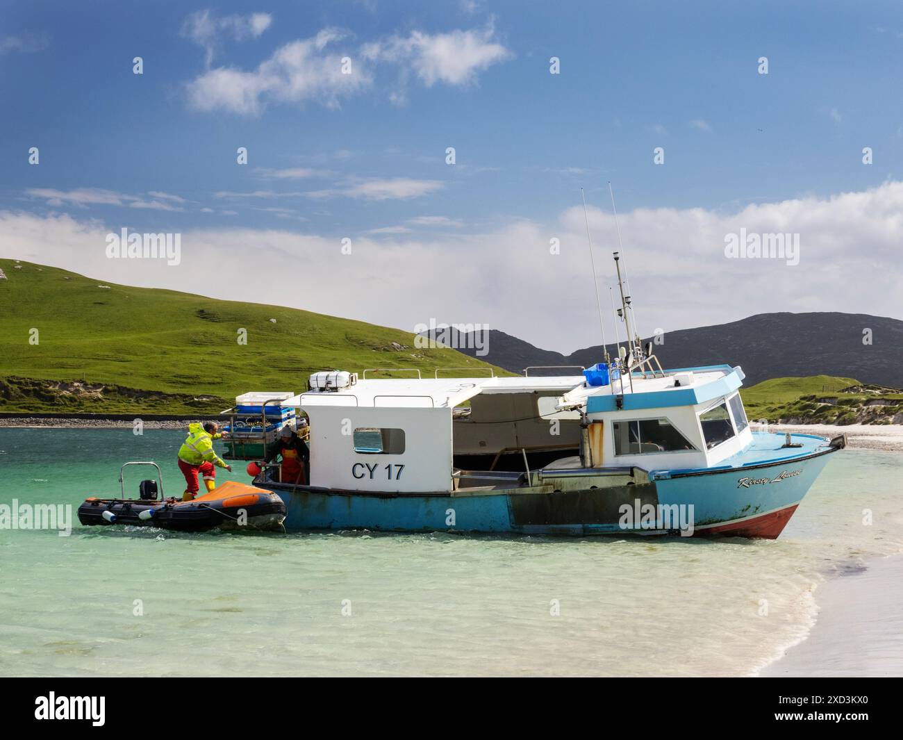 A fishing boat beached on Vatersay, off Barra, Outer Hebrides, Scotland ...