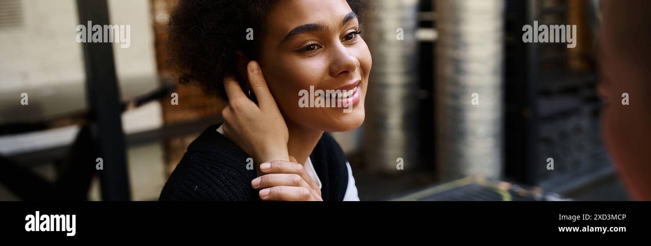 Two women engaged in conversation Stock Photo - Alamy