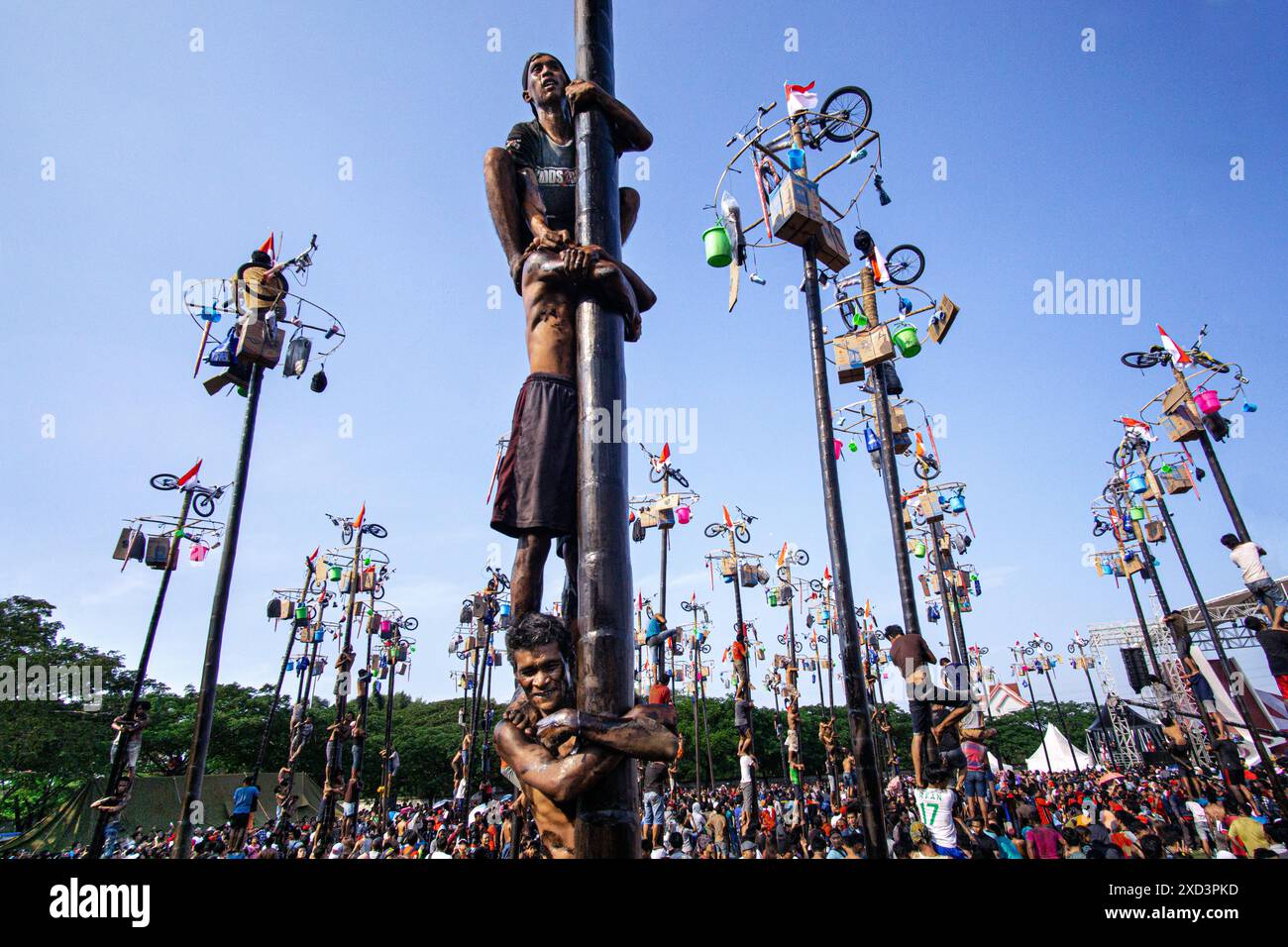 Climbing the greasy pole hi-res stock photography and images - Alamy