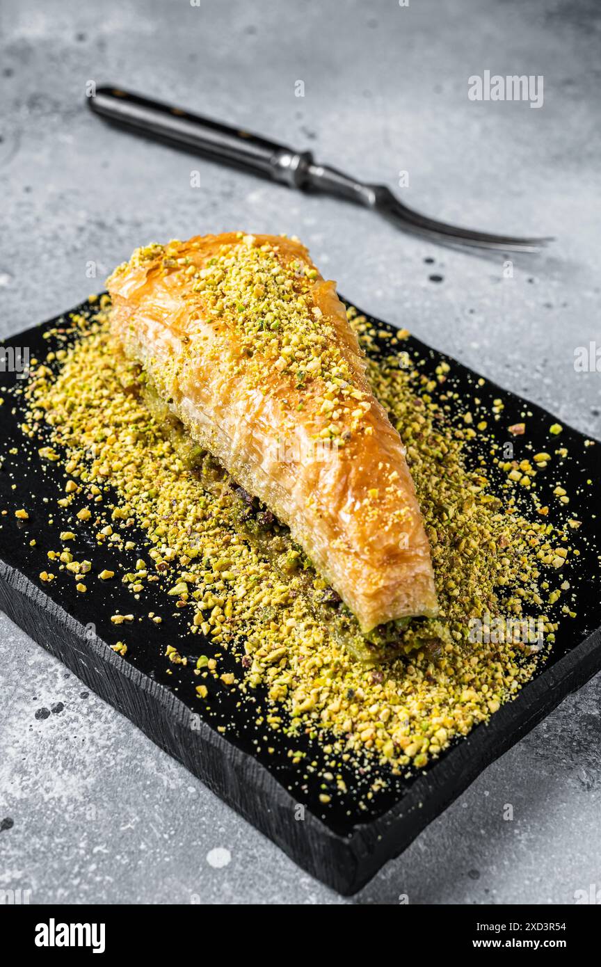 Turkish Dessert Havuc Dilim Baklava with pistachio and honey. Gray ...