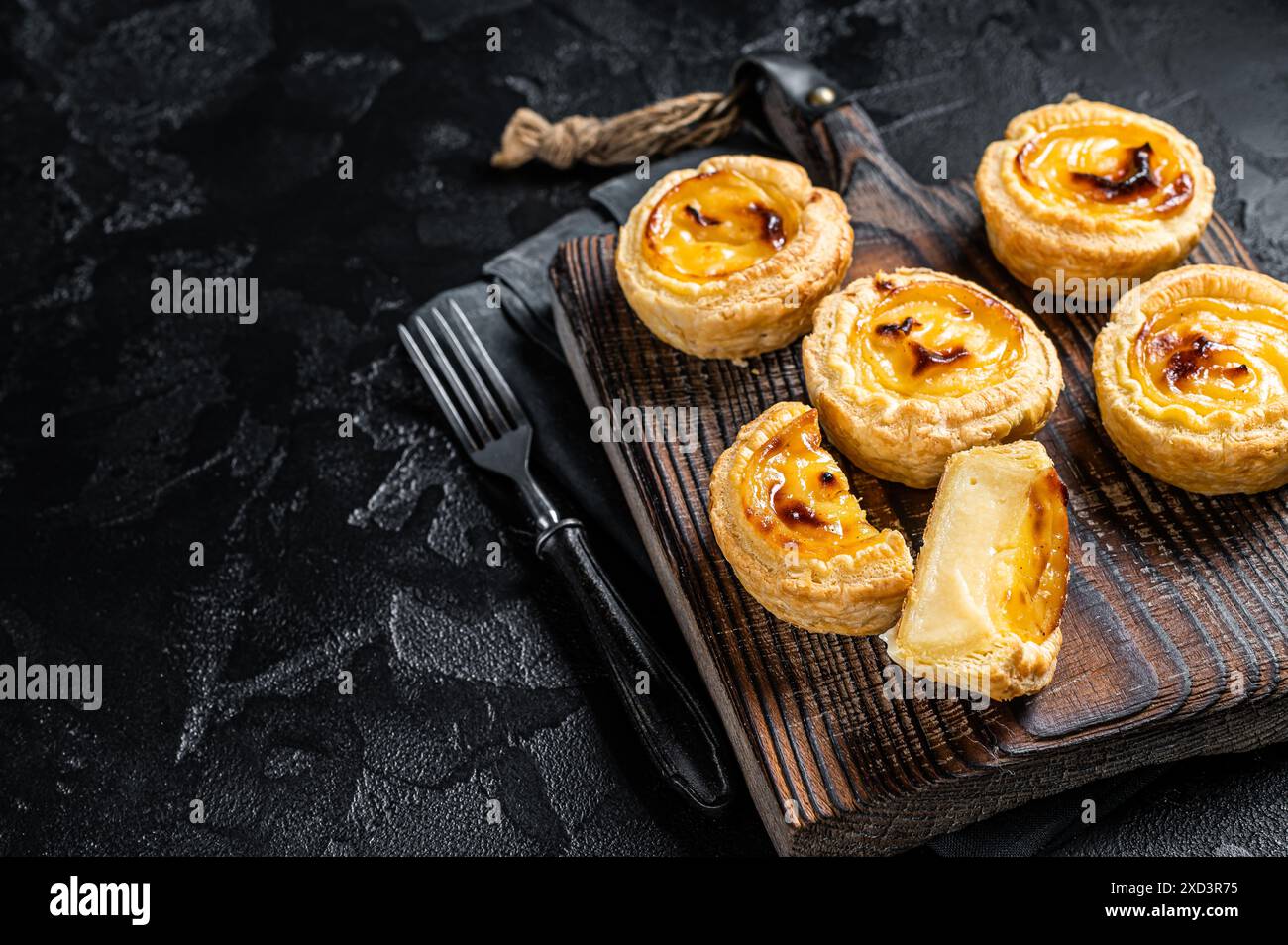 Custard Tarts Pasteis de Belem, Portuguese pastel de Nata. Black ...