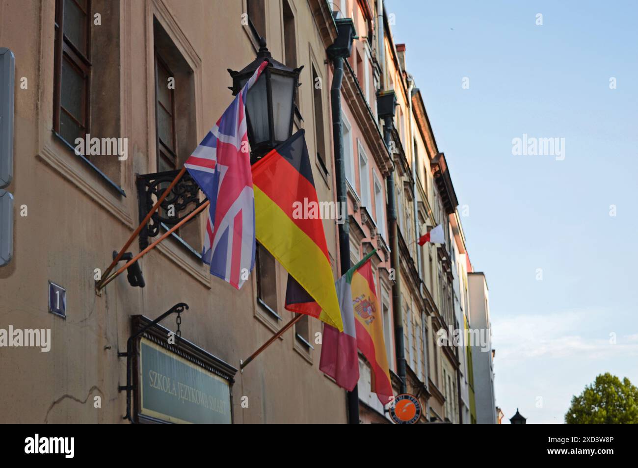 flags of different countries, language school building Stock Photo - Alamy