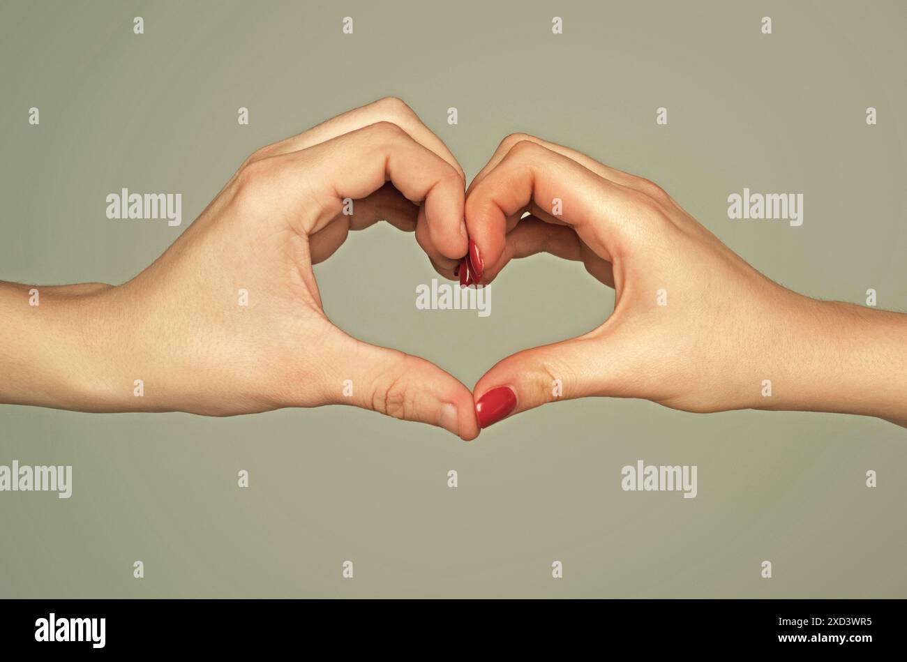 Female and male hands in form of heart. Hands in shape of love heart ...