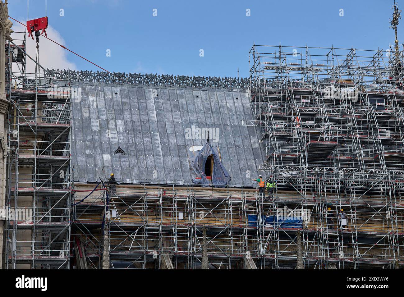 Paris June 19, 2024: The installation of the lead roofing is being ...