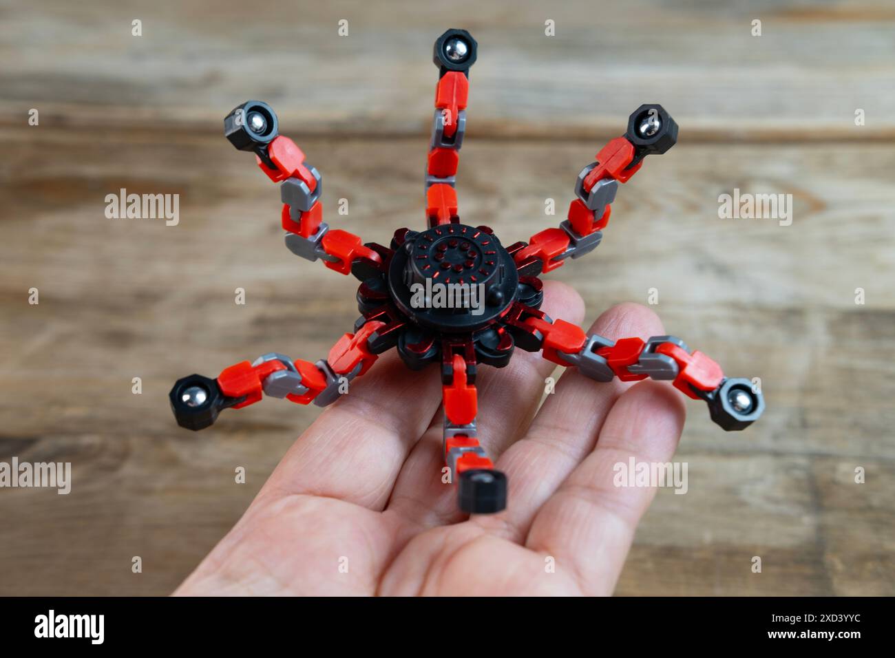 Spinner in female hand, stress relief, useful for people who are ...