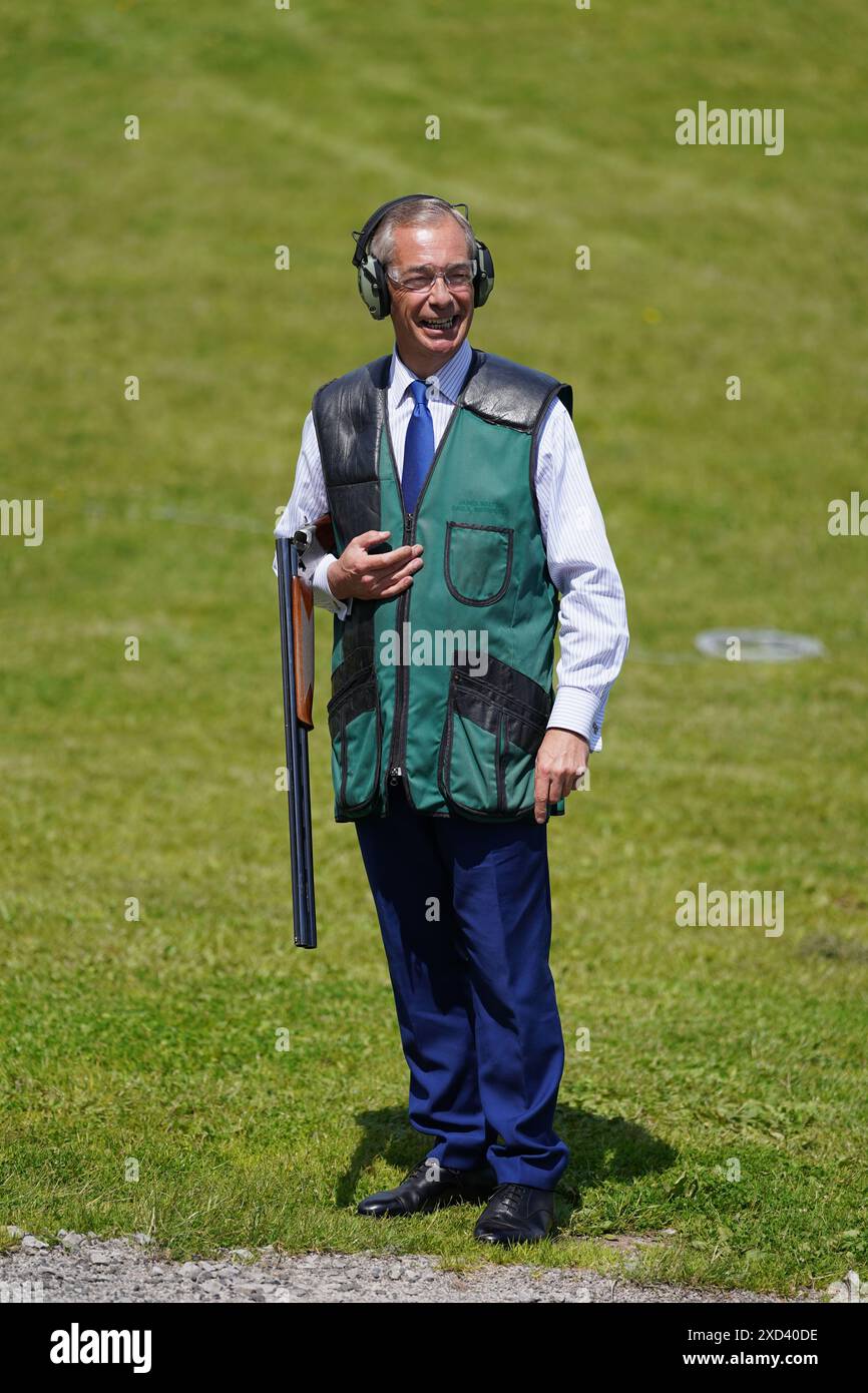 Reform UK leader Nigel Farage takes part in clay pigeon shooting during ...