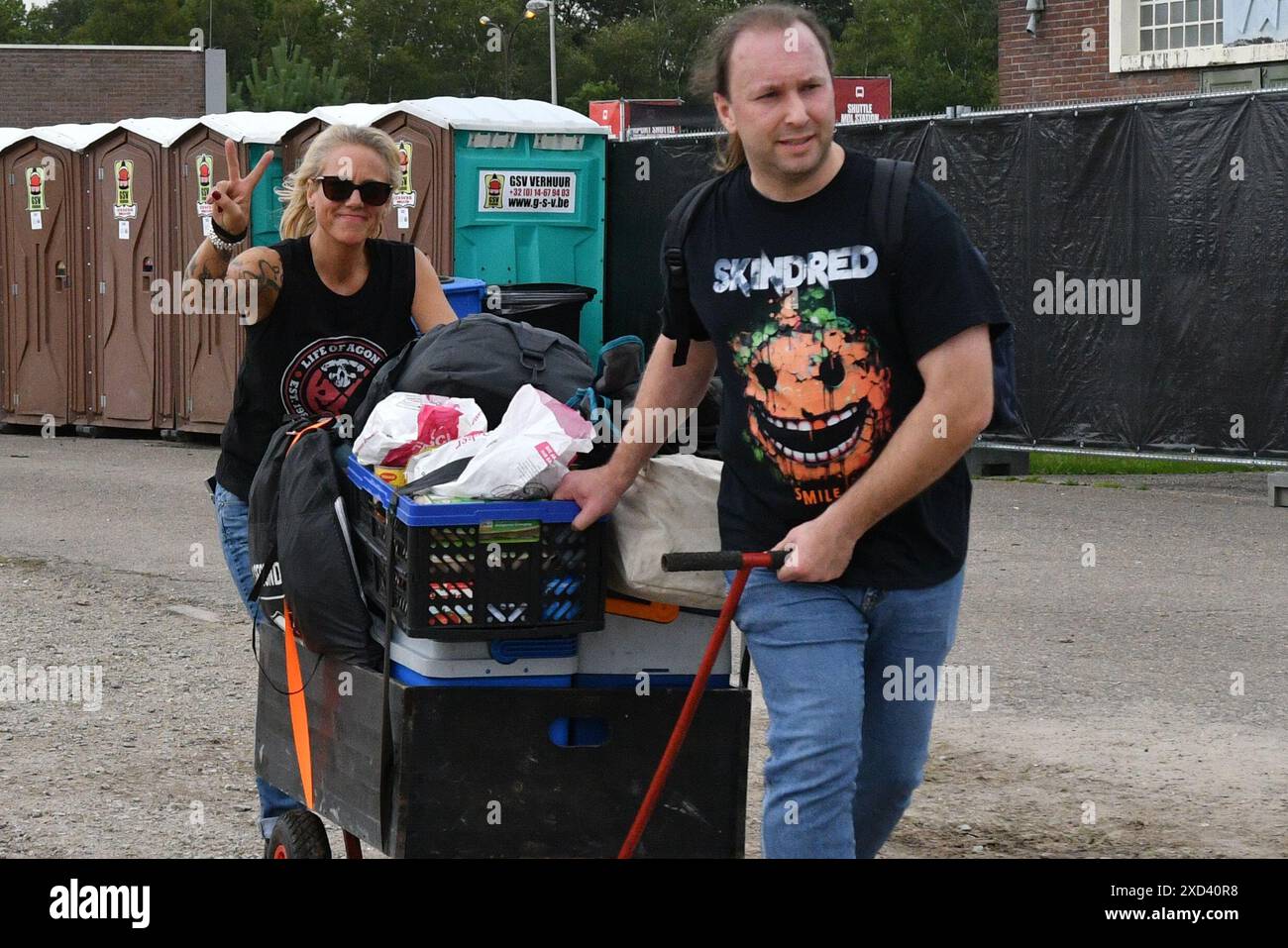 People arrive with camping gear, on the first day of the Graspop Metal ...