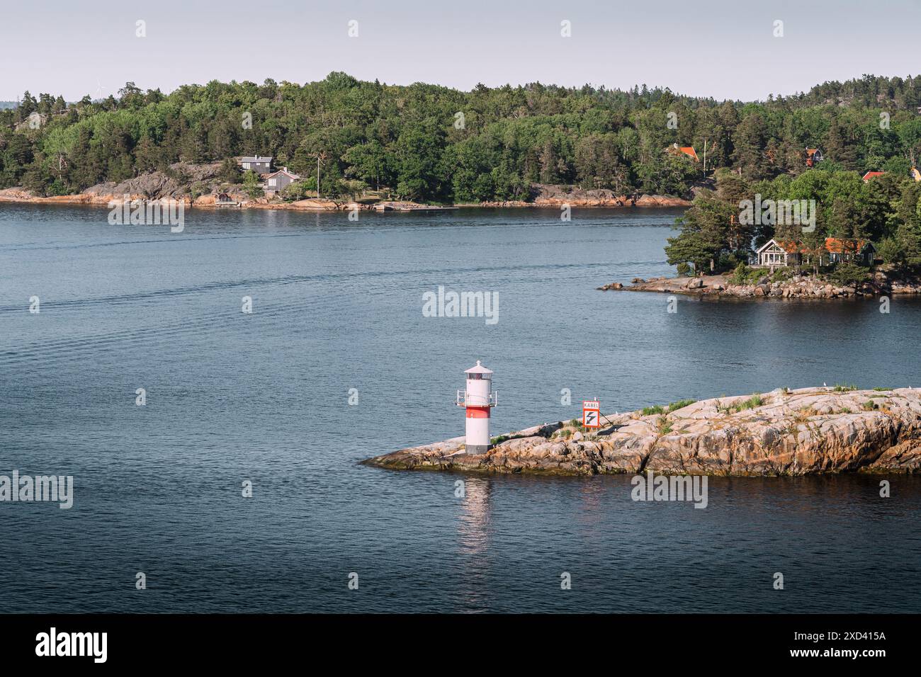 Island with a lighthouse in the Stockholm archipelago. Island in the ...