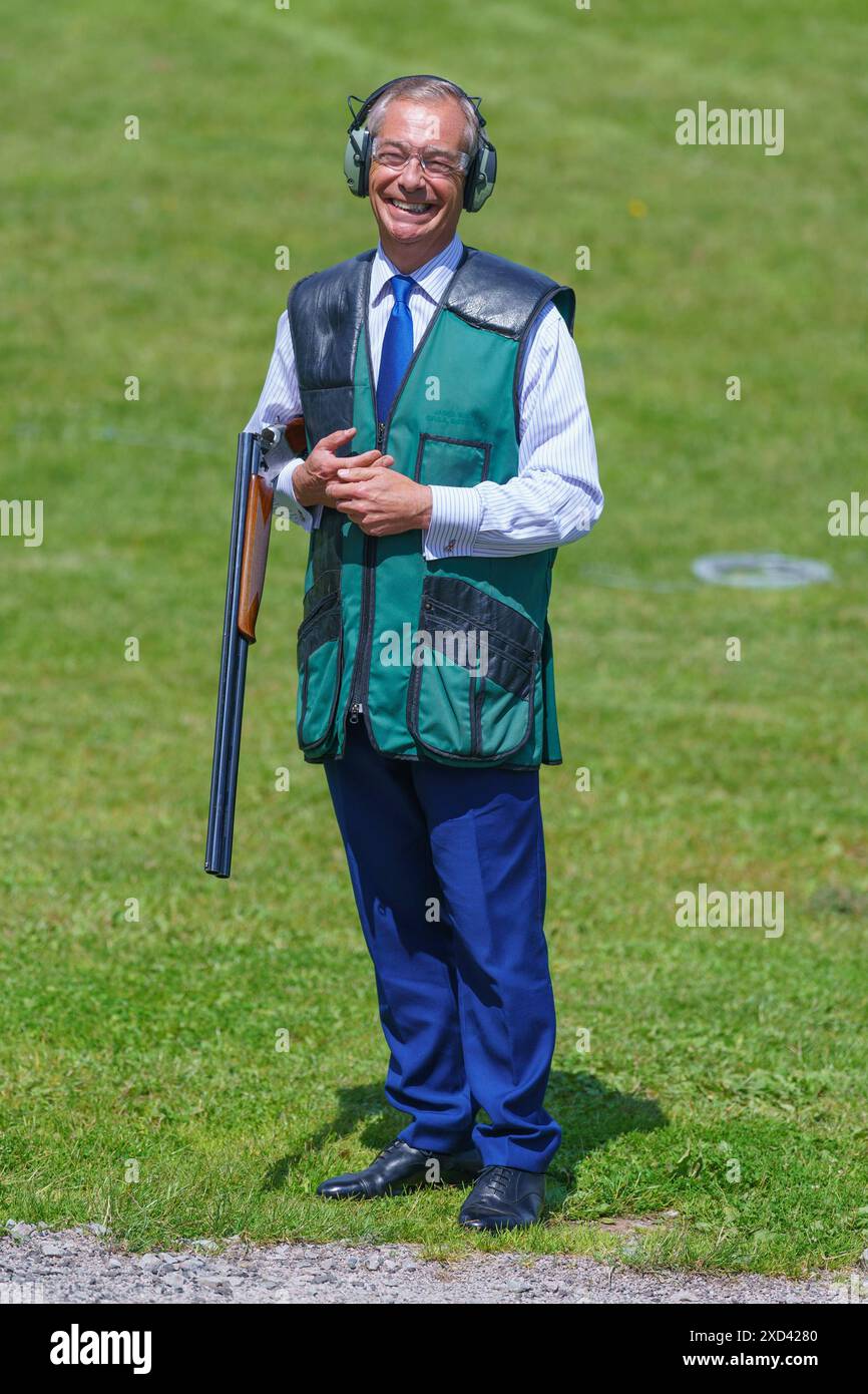 Reform UK leader Nigel Farage takes part in clay pigeon shooting during ...