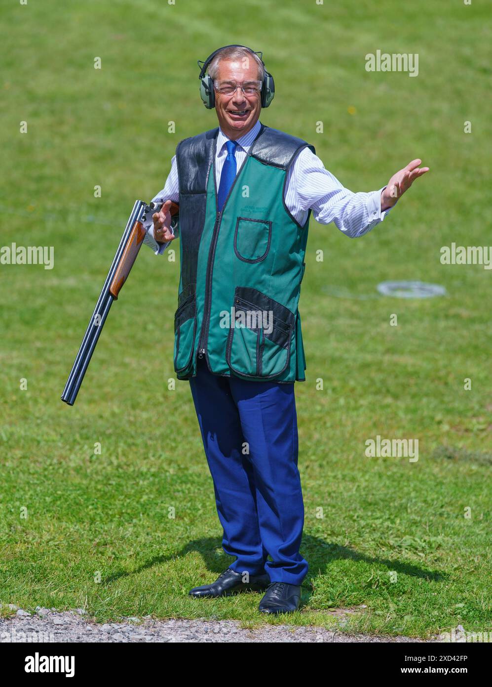 Reform UK leader Nigel Farage takes part in clay pigeon shooting during ...
