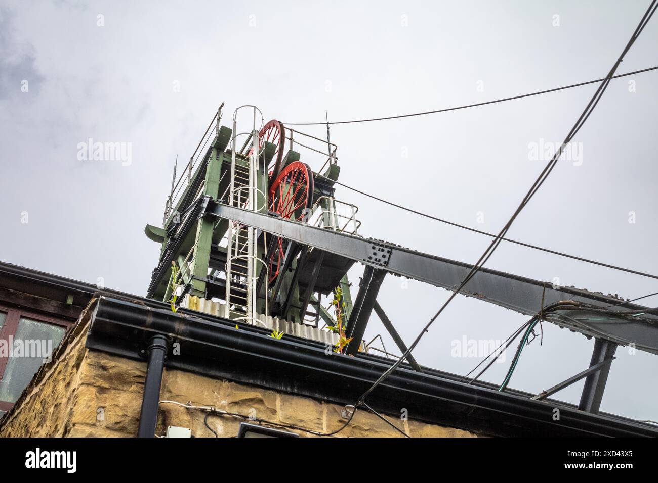 The winding wheels and headstock at Caphouse Colliery and Hope Pit, the ...
