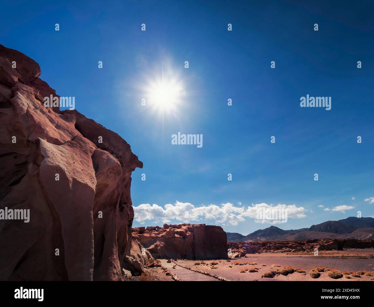 Red rock formations at the ancient petroglyphs in the Atacama Desert ...