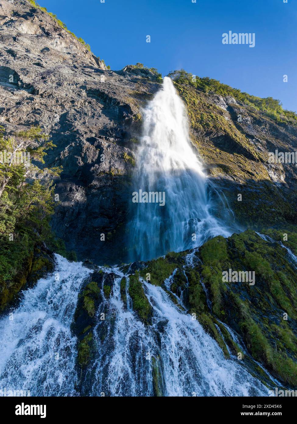 Waterfall at the Bay of Last Hope, fjords and mountains, Puerto Natales ...