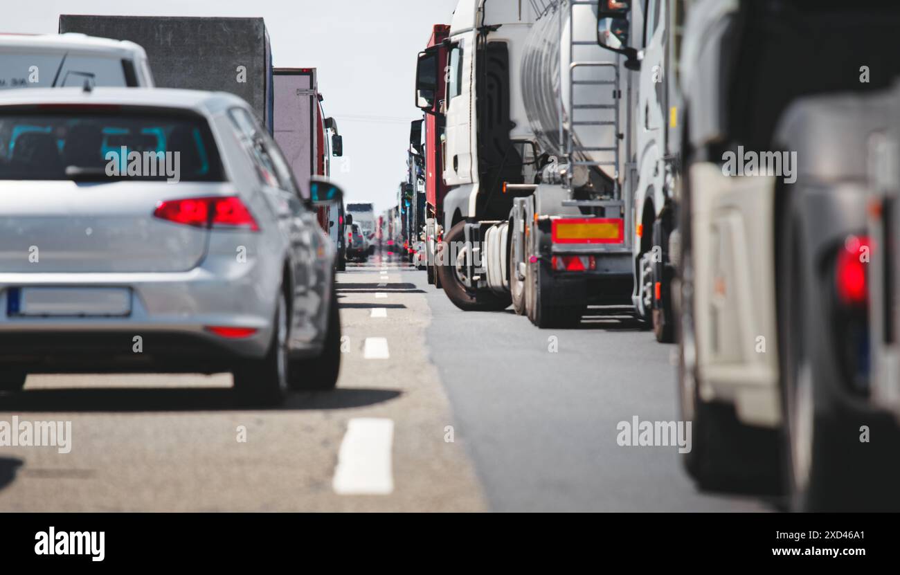 Cars and truck in traffic jam congestion at highway road Stock Photo - Alamy