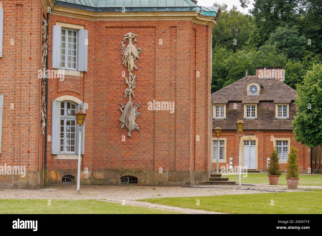 Side view of a historic brick building with elaborate ornamentation and ...