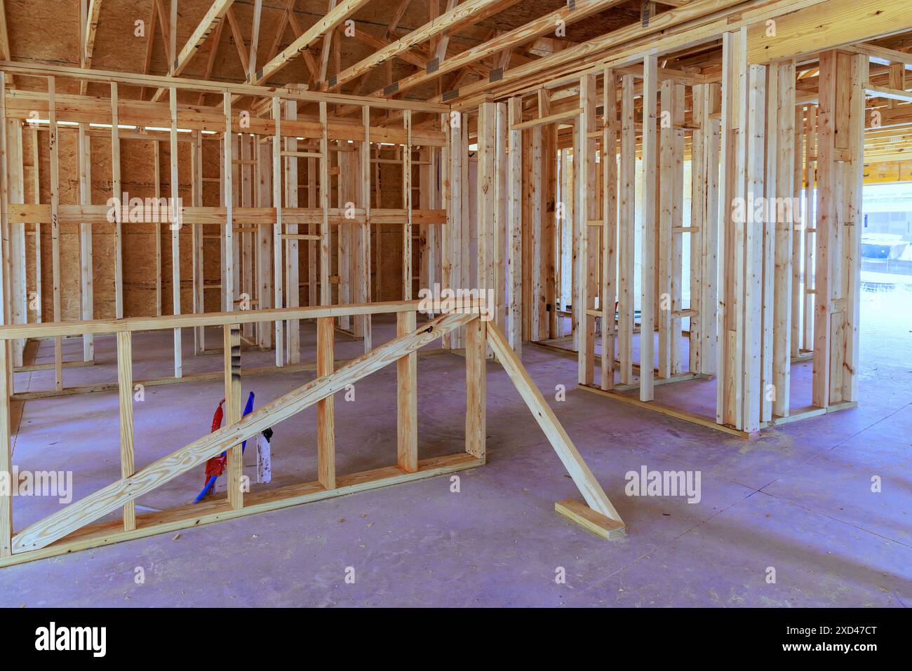 Timber wood stick frames framing beams during construction of new home ...