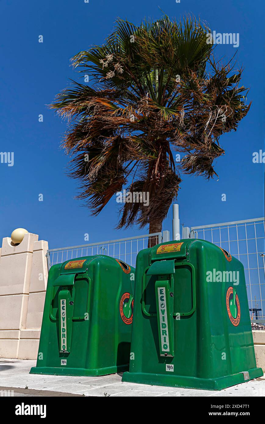 Green environmental containers at the roadside, Rota, Andalusia, Spain ...