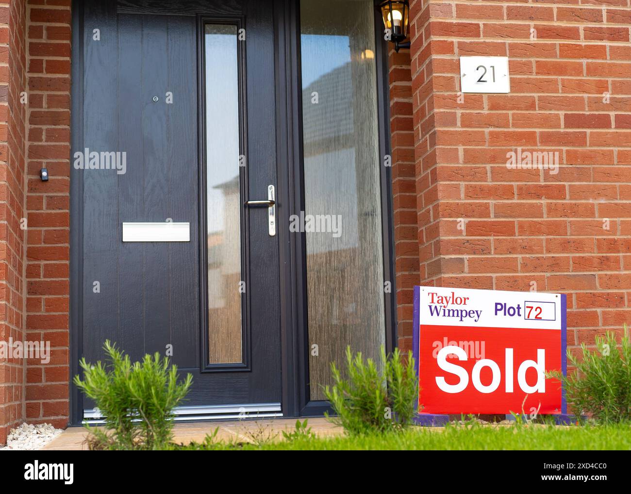 Sold plot sign on a new build house for Taylor Wimpey Homes Stock Photo ...