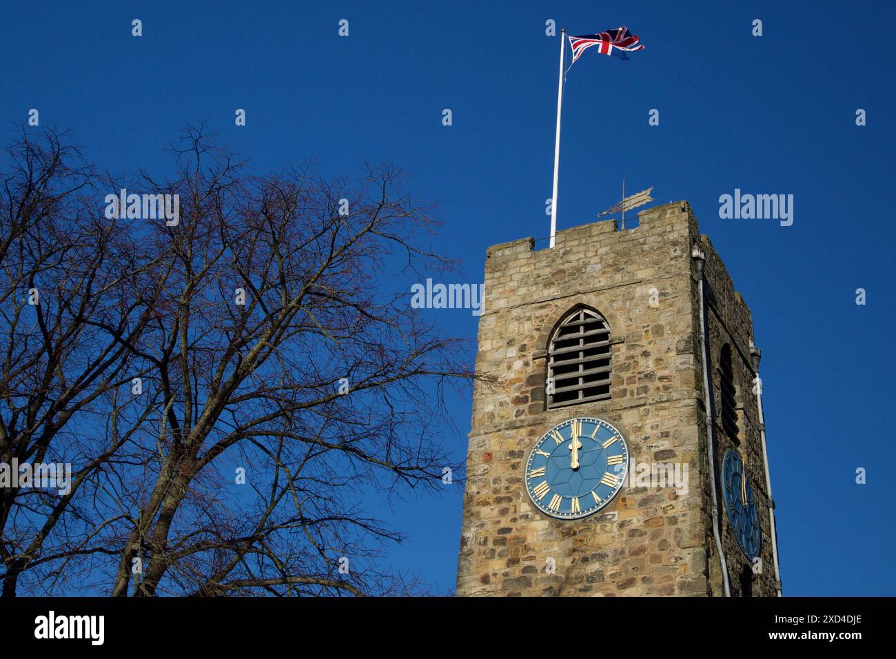Noon at St Andrew's Church clock tower in Corbridge, Northumberland ...