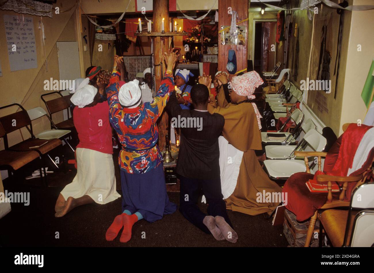 Woman kneeling church 20th century hi-res stock photography and images ...