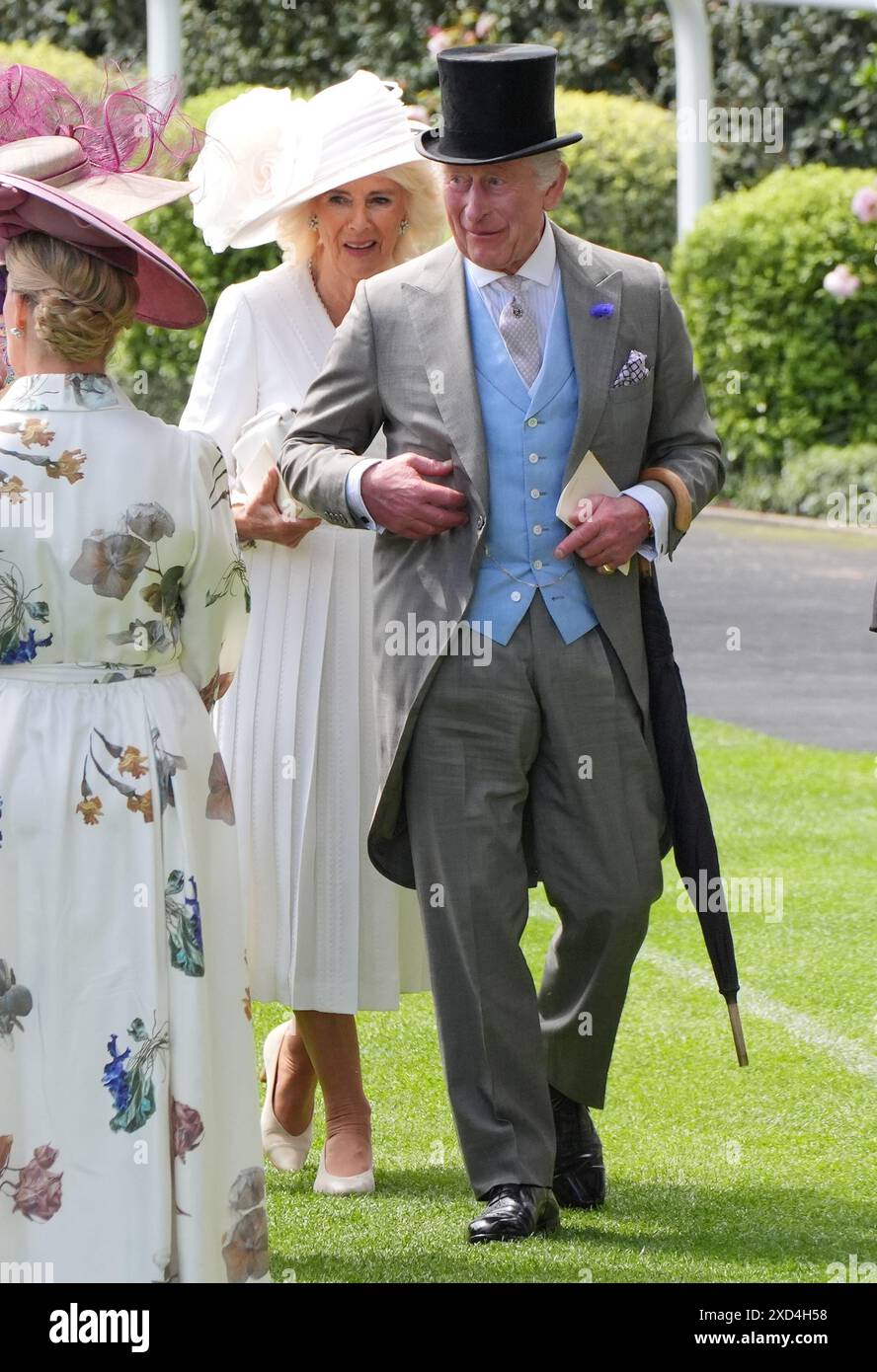 King Charles III (right) and Queen Camilla on day three of Royal Ascot ...