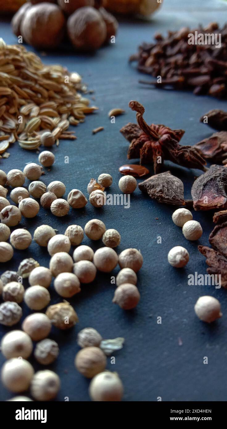 Photo of some cooking ingredients such as white pepper, pepper, nutmeg ...