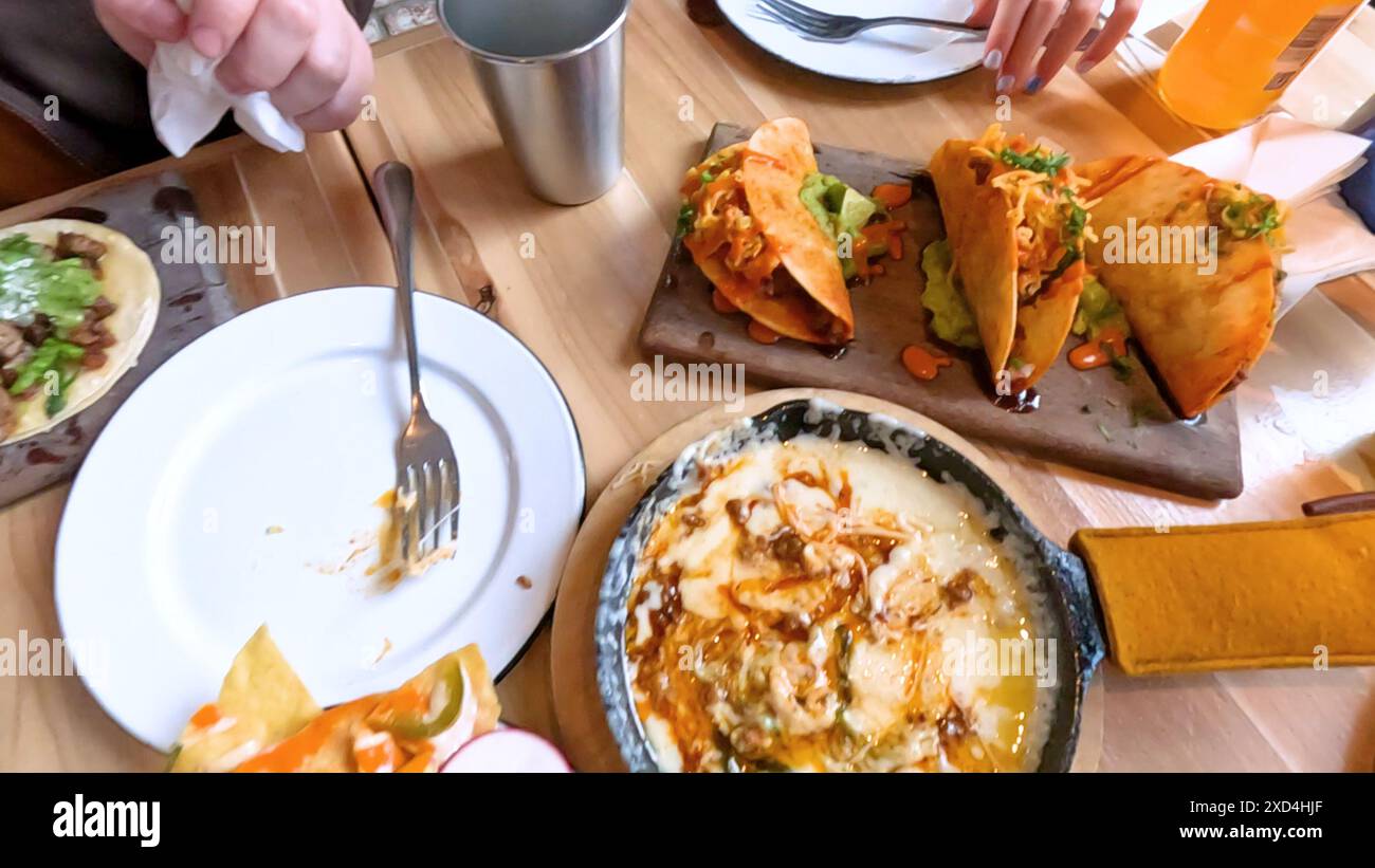 Picking food of platter hi-res stock photography and images - Alamy