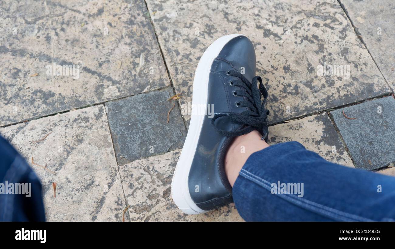 Girl wearing flat shoes hi-res stock photography and images - Alamy