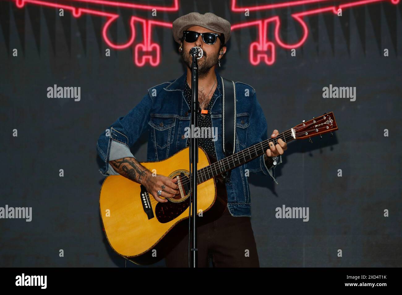 Juancho Conejo, singer of the musical group Sidecars, performing during ...
