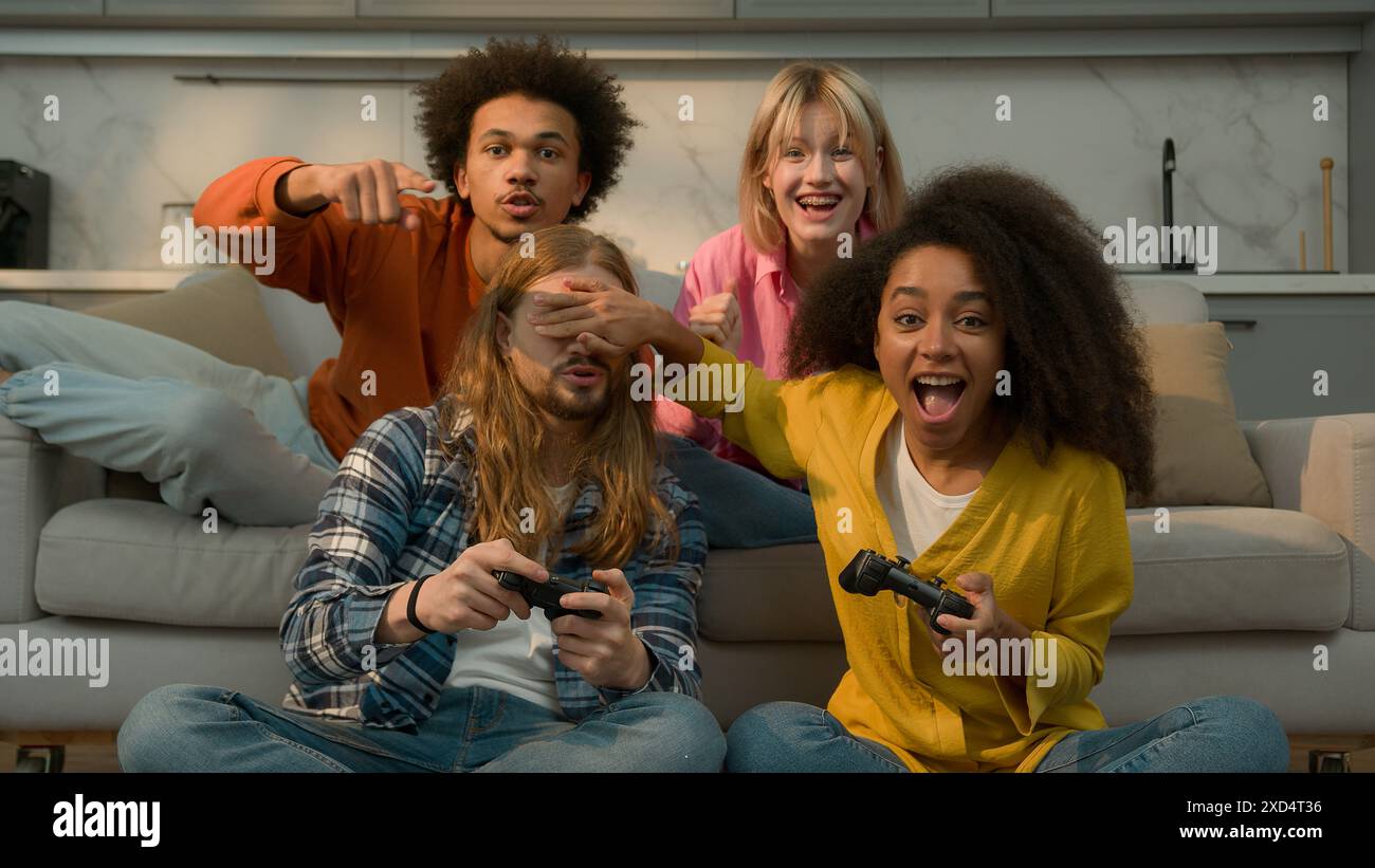 African American woman girl cheating playing console video game win ...