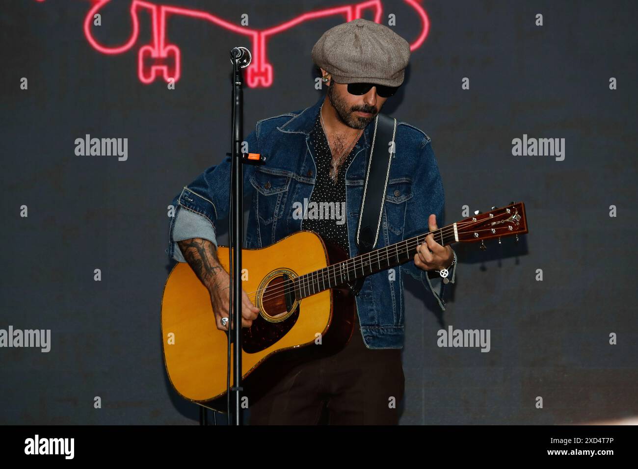 Juancho Conejo, singer of the musical group Sidecars, performing during ...