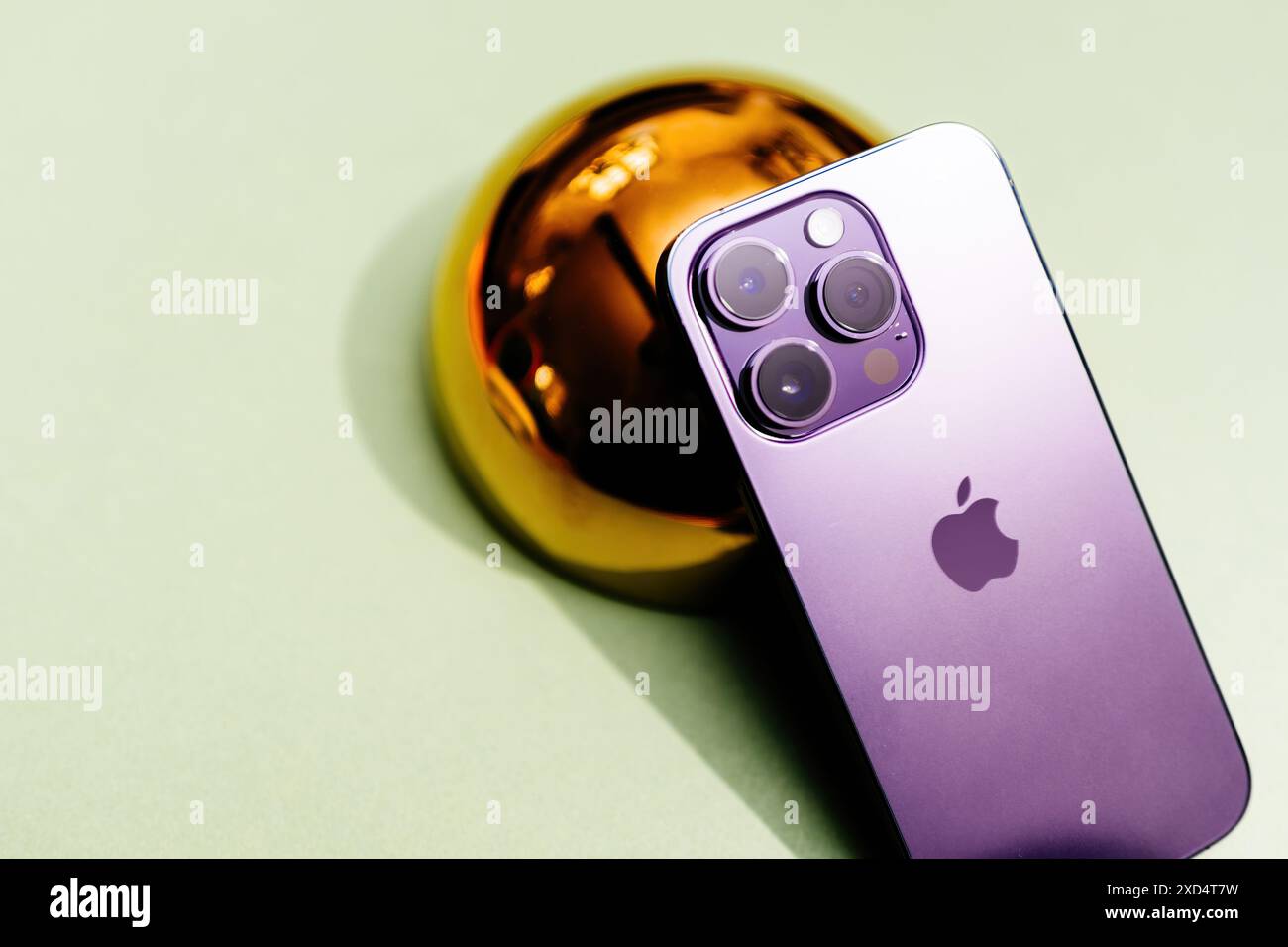 Paris, France - Sep 29, 2022: A close-up of the back of a purple iPhone ...