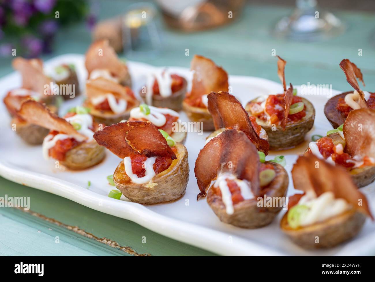Patatas bravas in mini format and topped with delicious air-dried ham ...