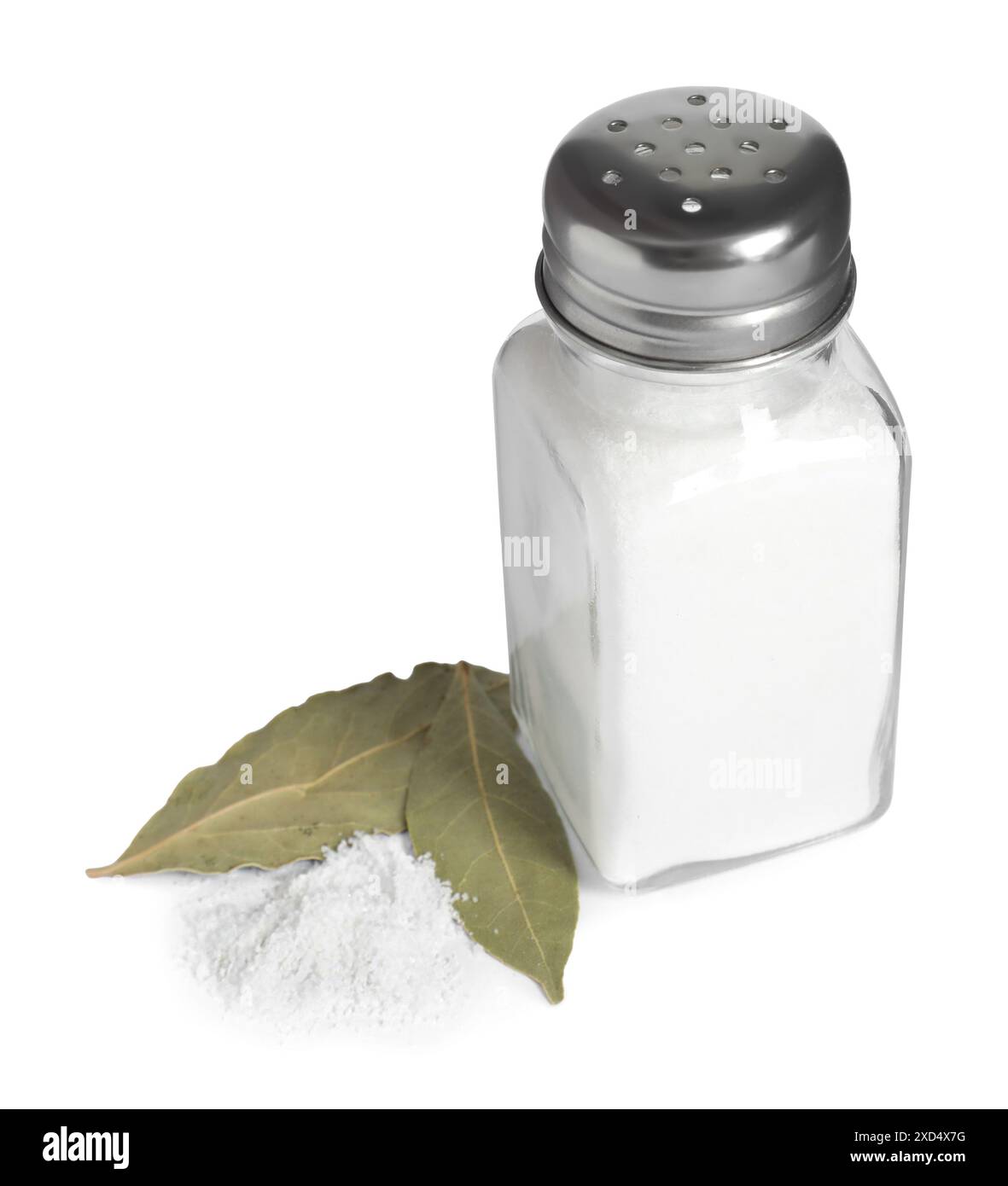 Salt shaker and bay leaves isolated on white Stock Photo - Alamy