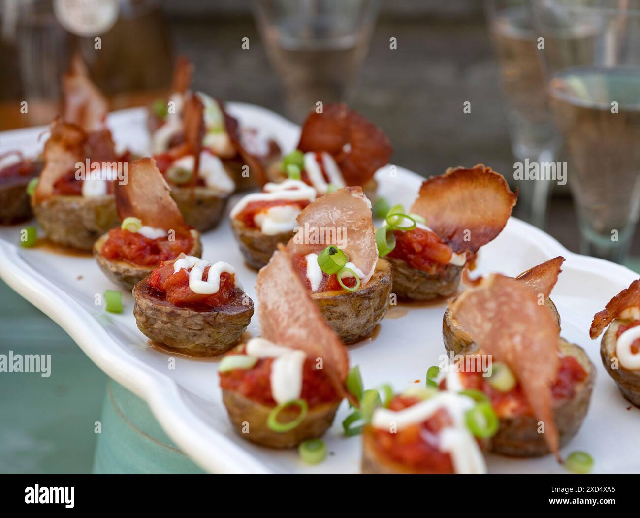 Patatas bravas in mini format and topped with delicious air-dried ham ...