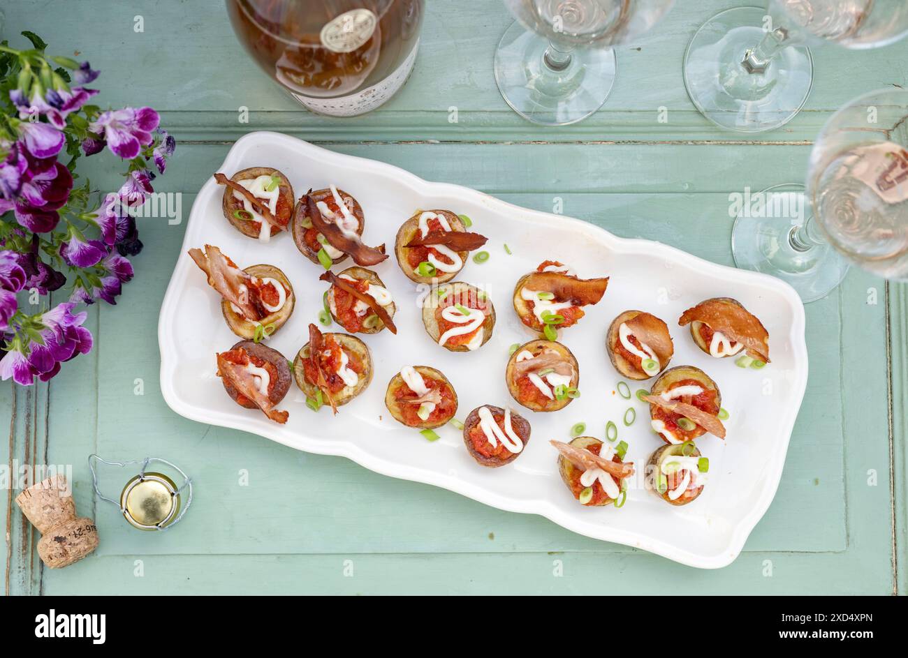 Patatas bravas in mini format and topped with delicious air-dried ham ...