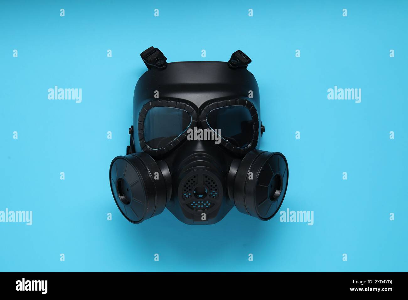 One gas mask on light blue background, top view Stock Photo - Alamy